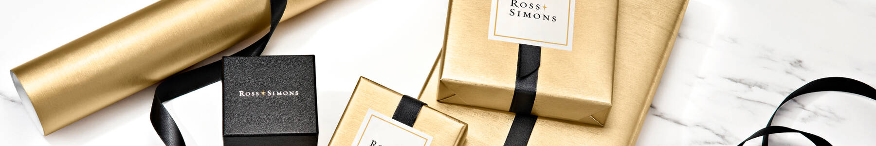 image featuring Ross-Simons gift boxes and wrapped gift boxes